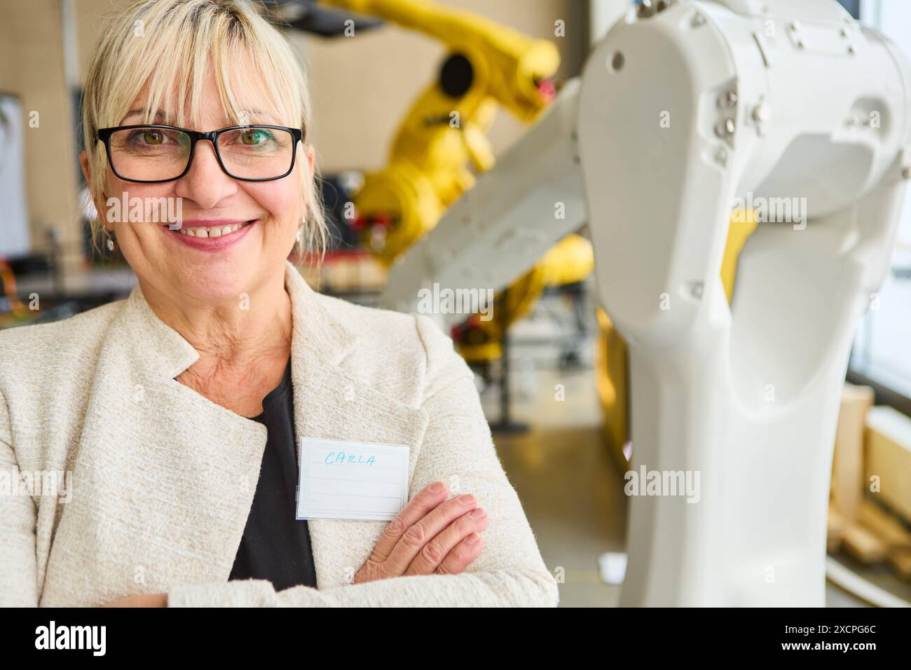 Confident female engineer in a professional setting with an advanced ...