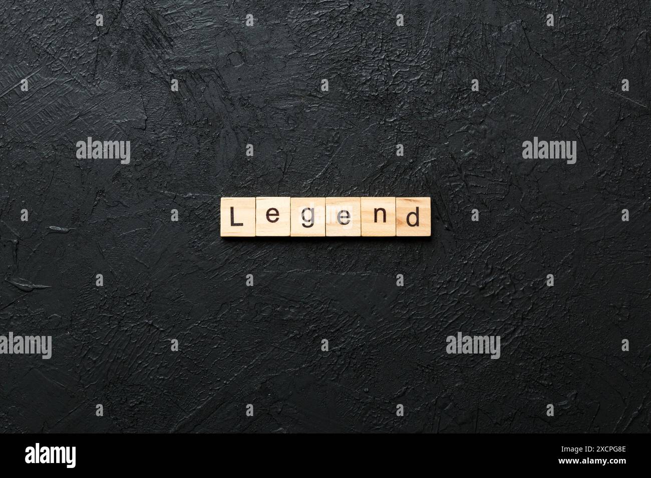 legend word written on wood block. legend text on cement table for your desing, concept Stock ...