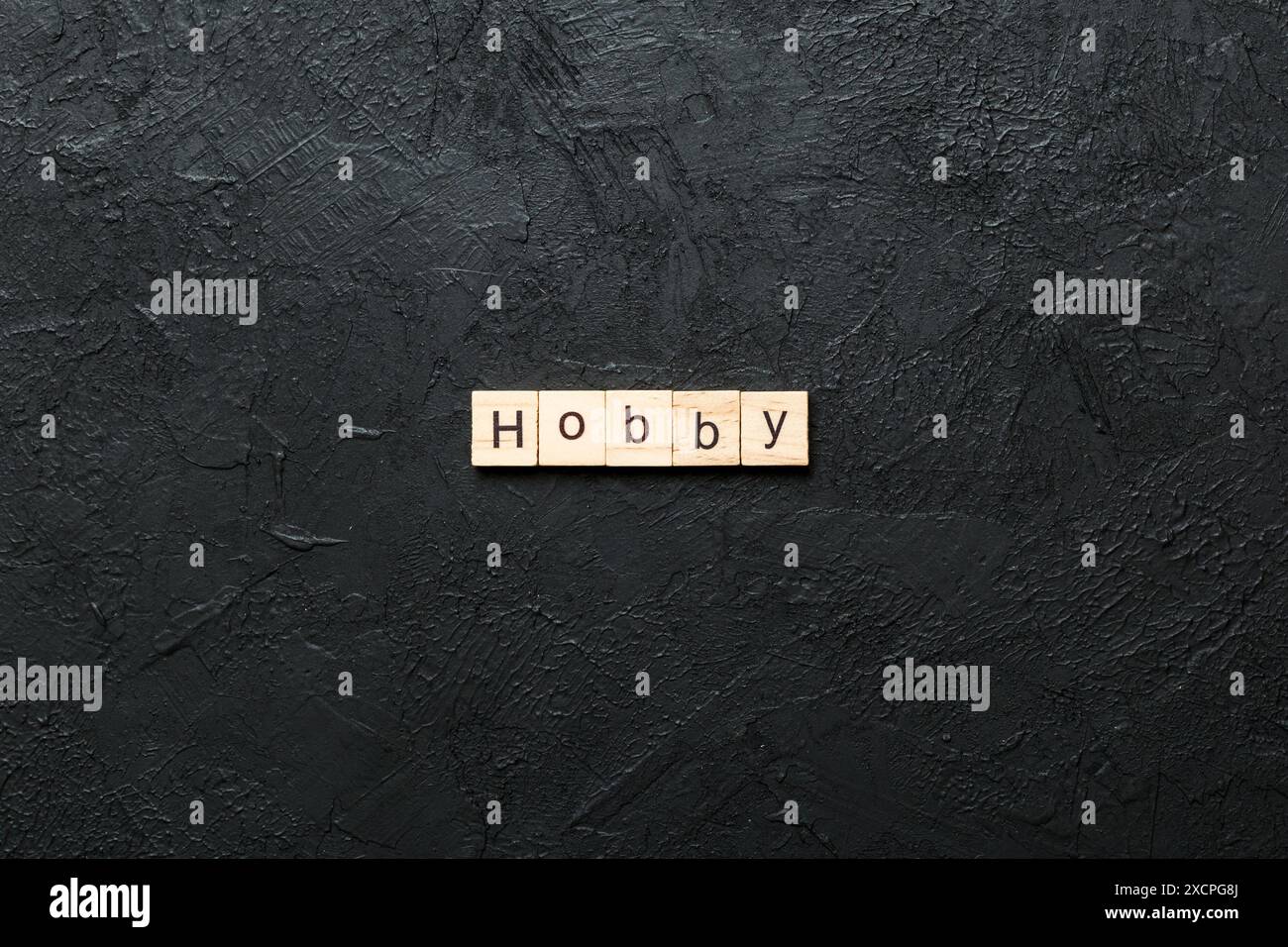 HOBBY word written on wood block. HOBBY text on cement table for your desing, concept Stock ...