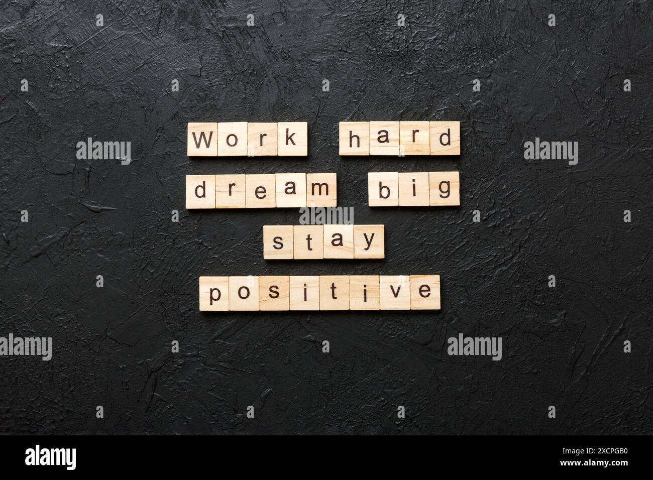 Work hard dream big stay positive word written on wood block. Work hard ...