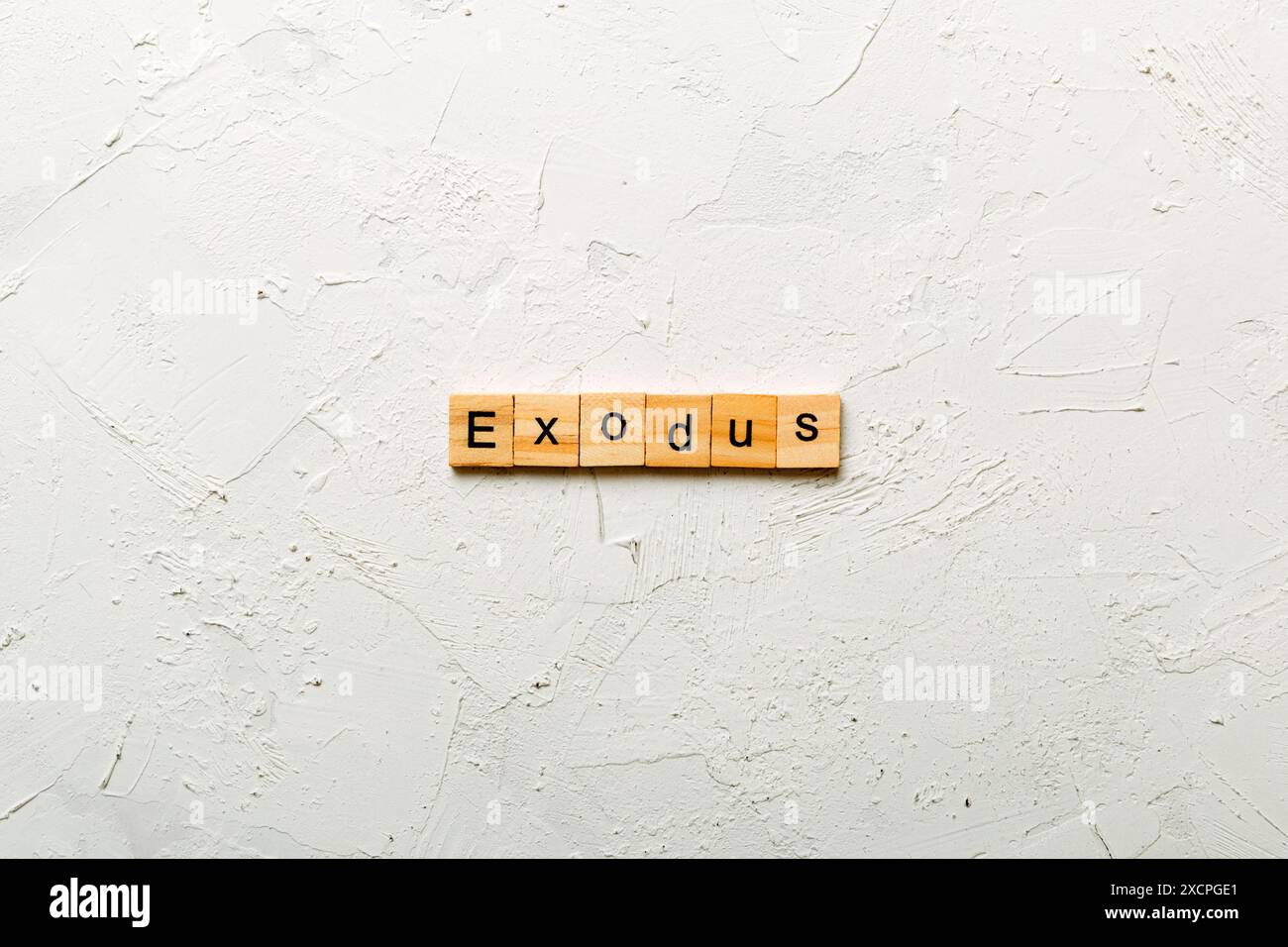 exodus word written on wood block. exodus text on table, concept Stock ...