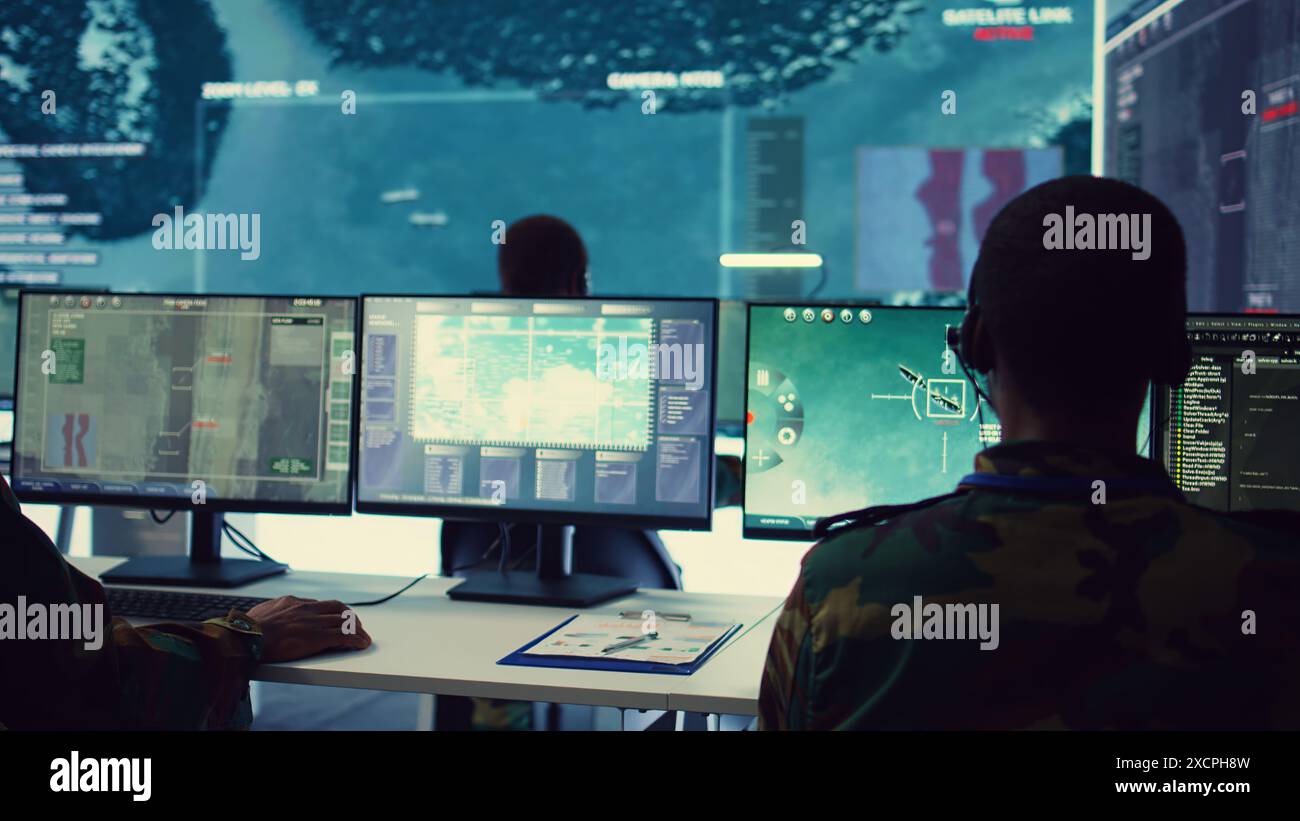 Military personnel employing the army satellite reconnaissance system ...