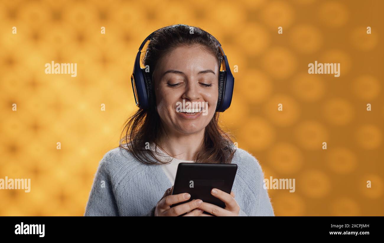 Voice actor smiling while reading ebook, portraying proud and sassy ...
