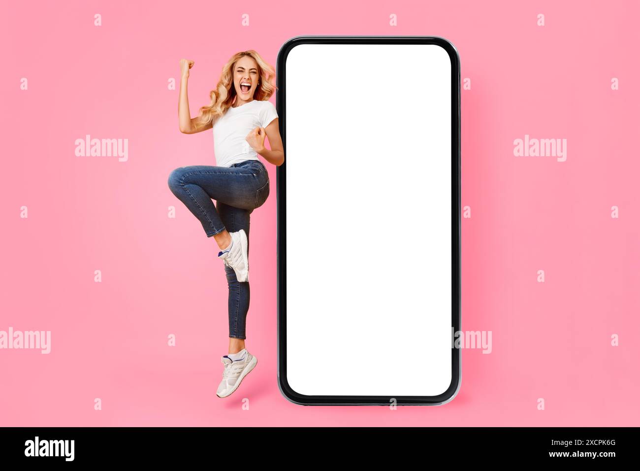 Excited Woman Jumping Near Large Smartphone With Blank White Screen ...