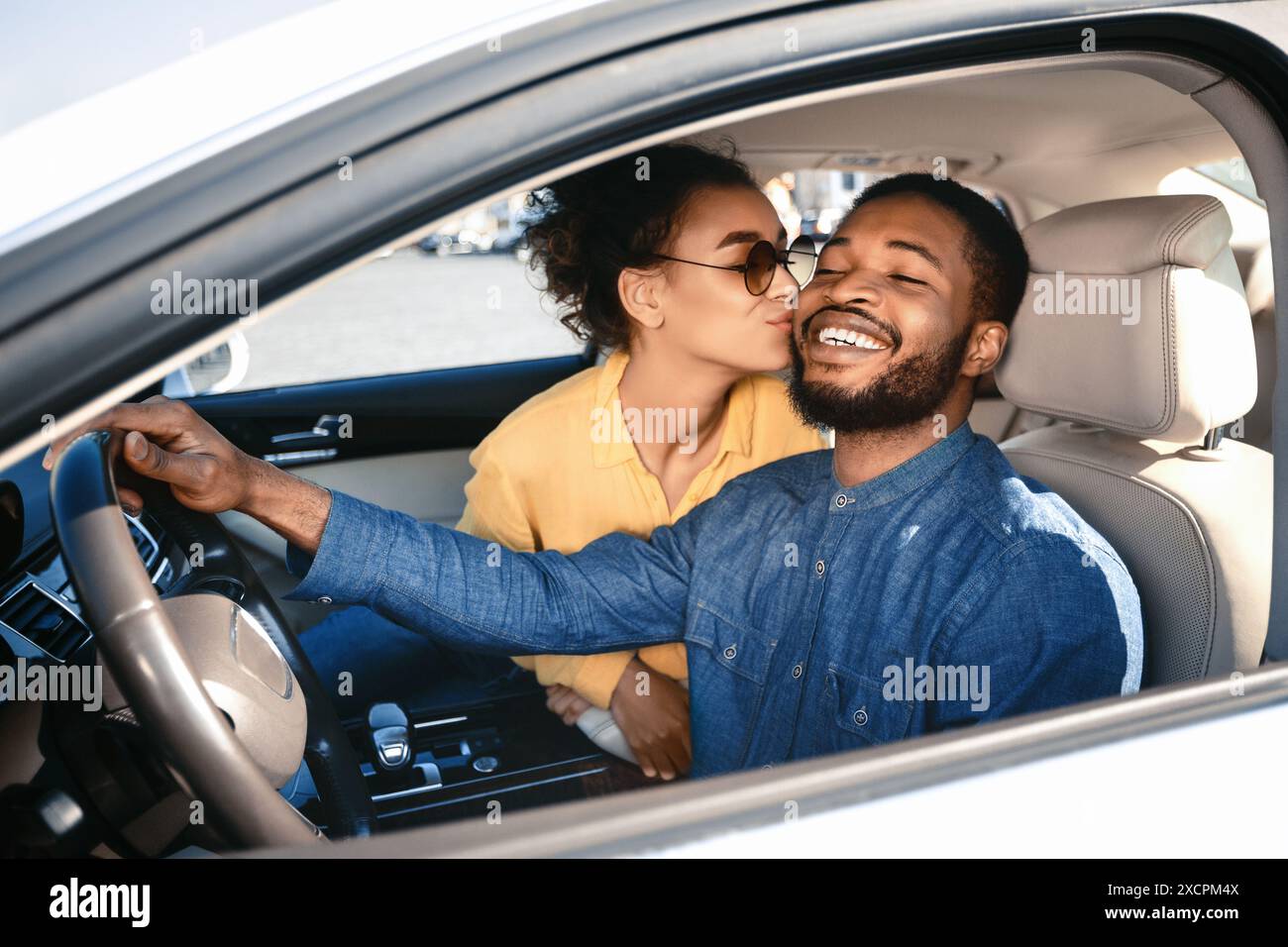 Happy couple enjoying car hi-res stock photography and images - Alamy