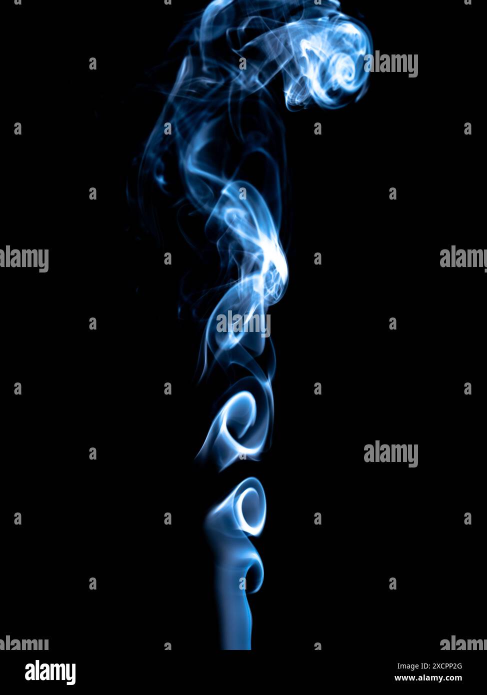 An abstract smoke art on a black background with intricate swirling ...