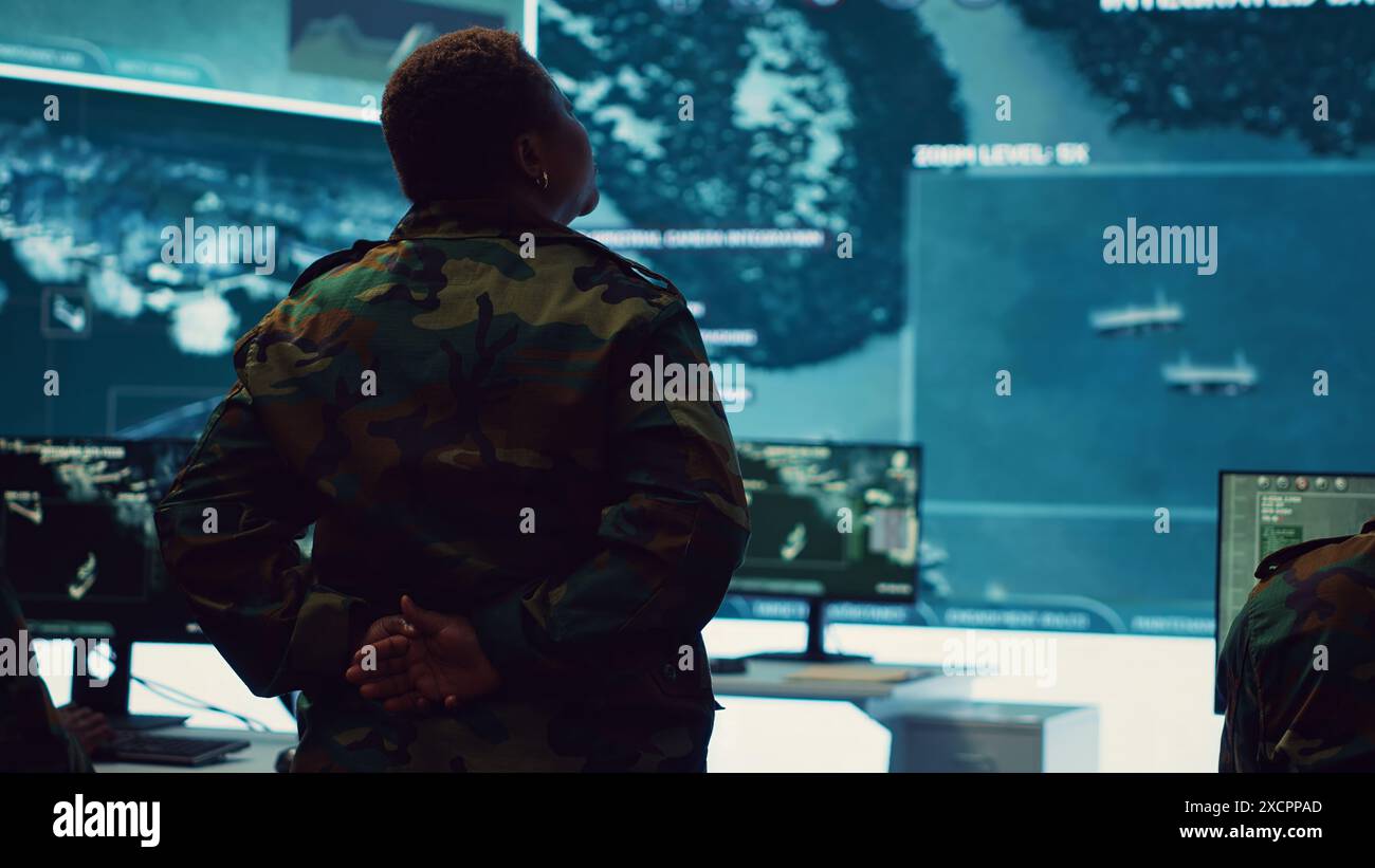 Female technical sergeant monitoring air traffic to detect any enemy ...