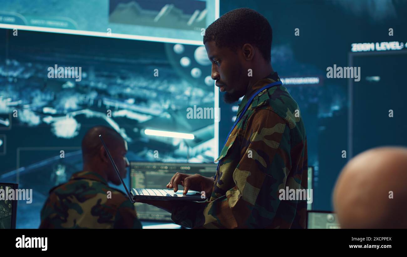 Military sergeant targeting enemy vessels on a gps satellite world map ...