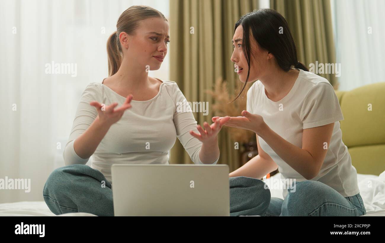 Two multiracial women upset frustrated sad worried friends female ...