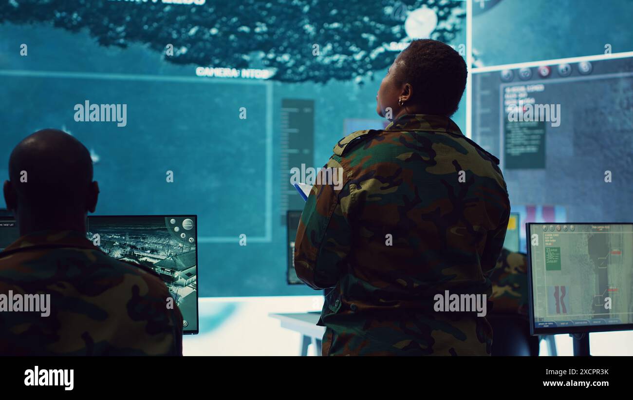 Woman colonel handling a special operation with big data in monitoring ...