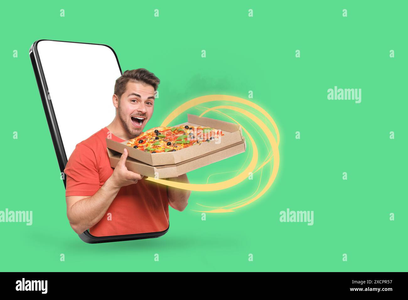 Online food ordering. Man with pizza on smartphone screen against green ...