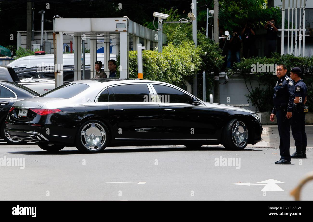 Former Thai Prime Minister Thaksin Shinawatra inside a vehicle leaves the Criminal Court in ...