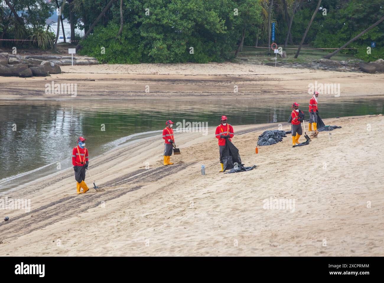 Contracted workers were quickly deployed to cleanup oil spill along ...