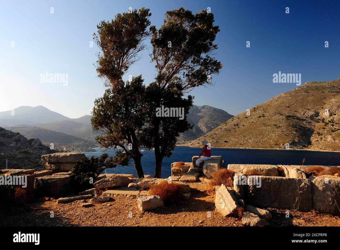 PPL PHOTO LIBRARY - COPYRIGHT RESERVED A young woman looking out over a ...