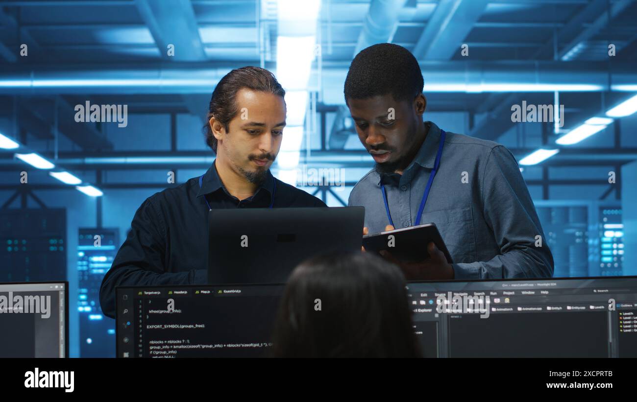 Data center team collaborating in hi-res stock photography and images ...