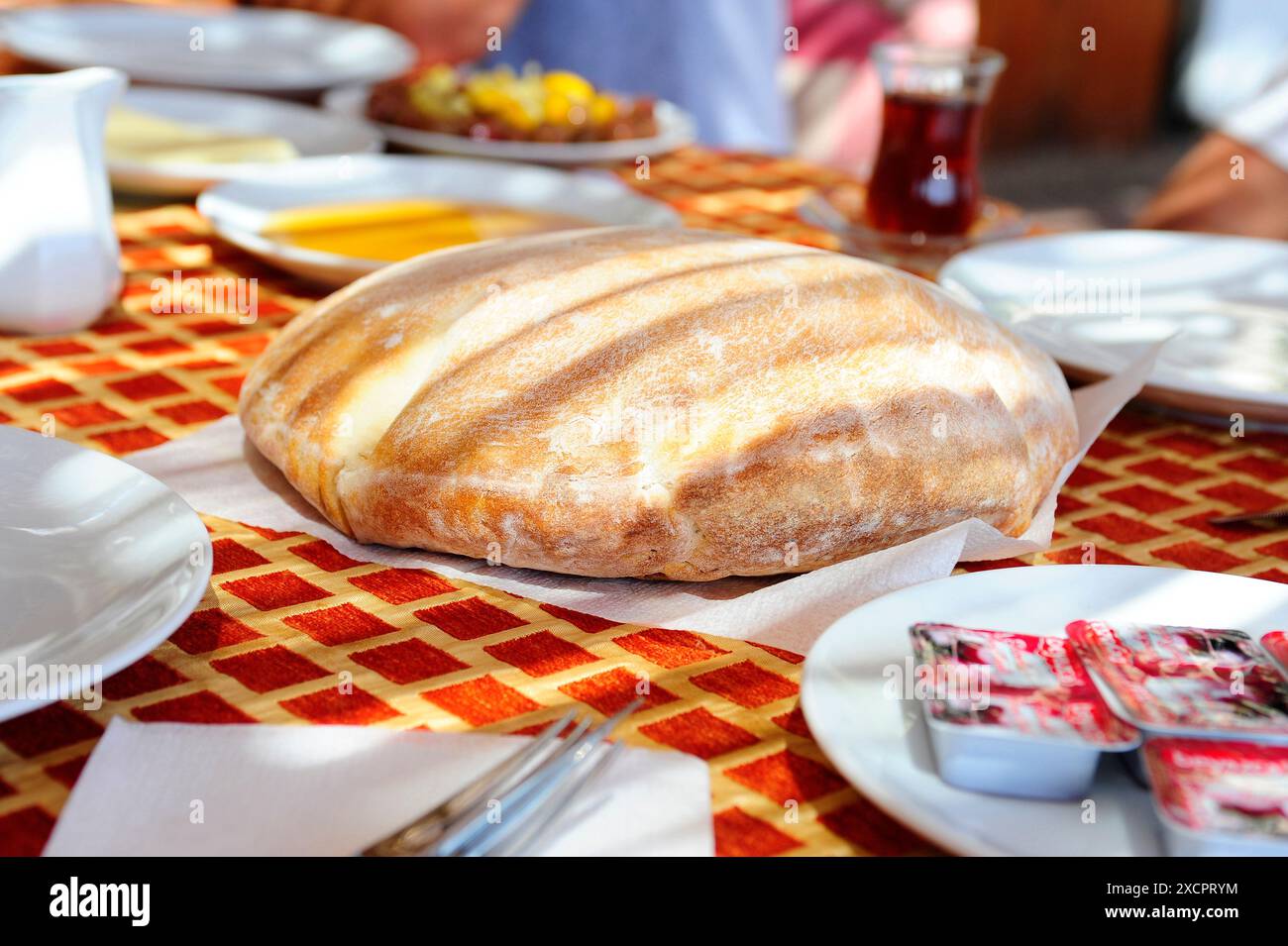 PPL PHOTO LIBRARY - COPYRIGHT RESERVED Turkish bread on a table PHOTO ...
