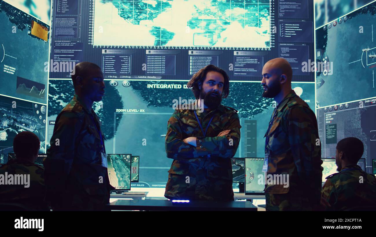 Army superior officers creating an attack plan using a hologram to ...