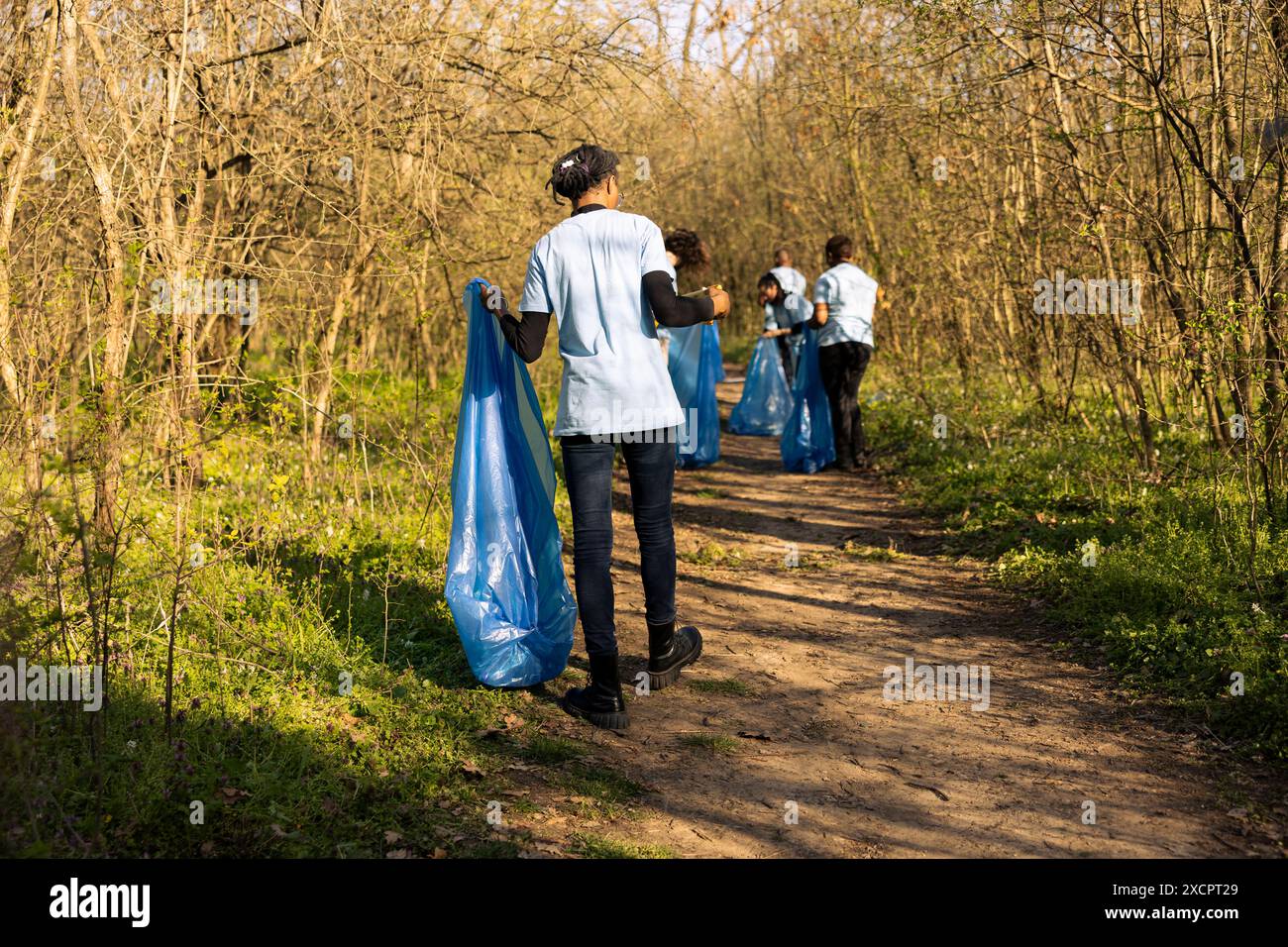 African people pick up waste hi-res stock photography and images - Alamy