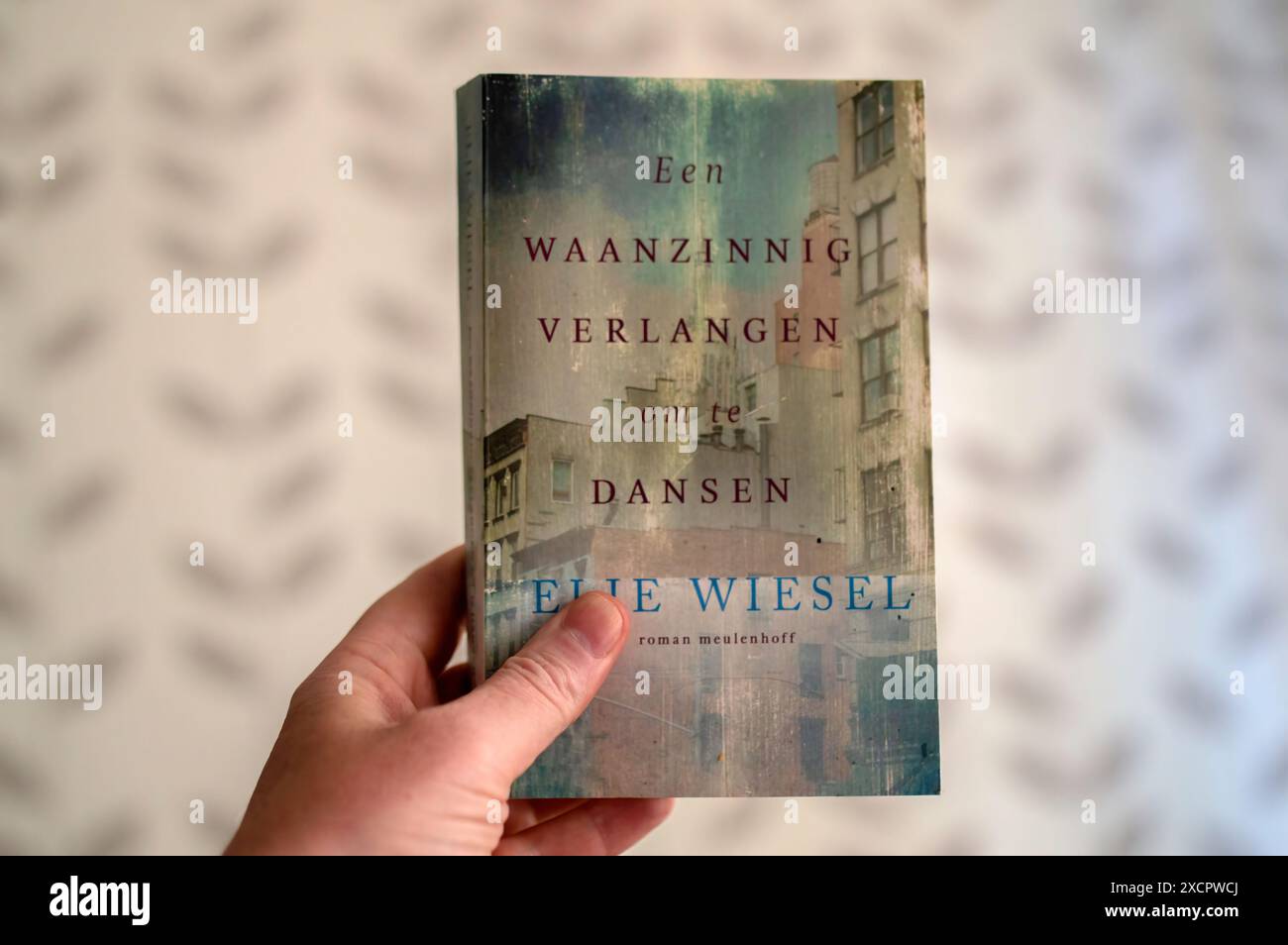 Holding A Dutch Version Of A Elie Wiesel Book At Amsterdam The ...
