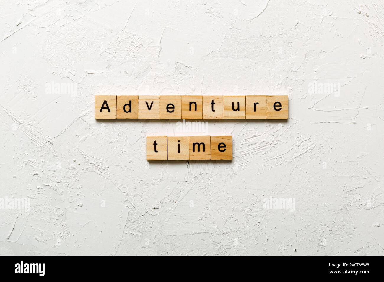 Adventure time word written on wood block. Adventure time text on ...