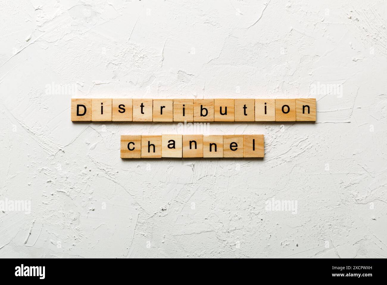 distribution channel word written on wood block. distribution channel ...