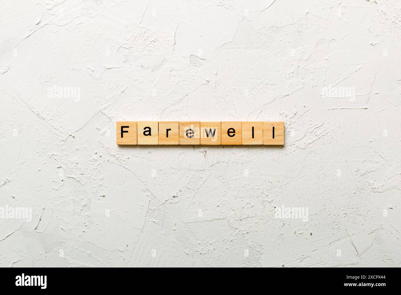 farewell word written on wood block. farewell text on table, concept ...