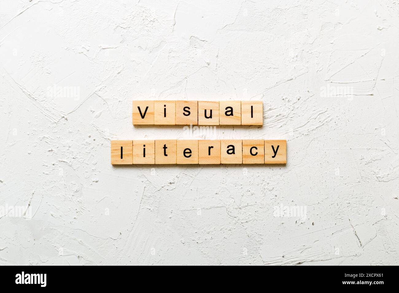 visual literacy word written on wood block. visual literacy text on ...