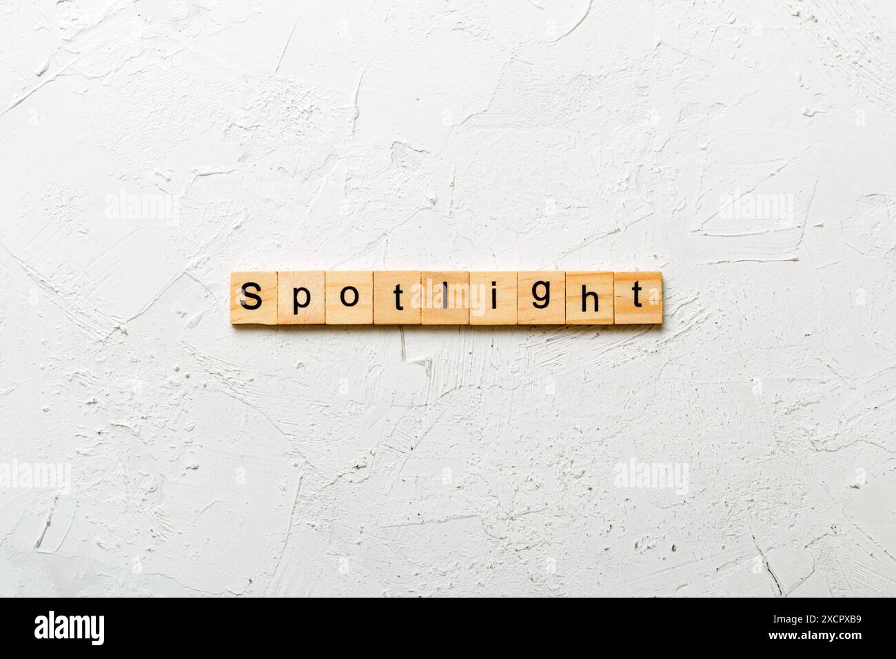 spotlight word written on wood block. spotlight text on table, concept ...