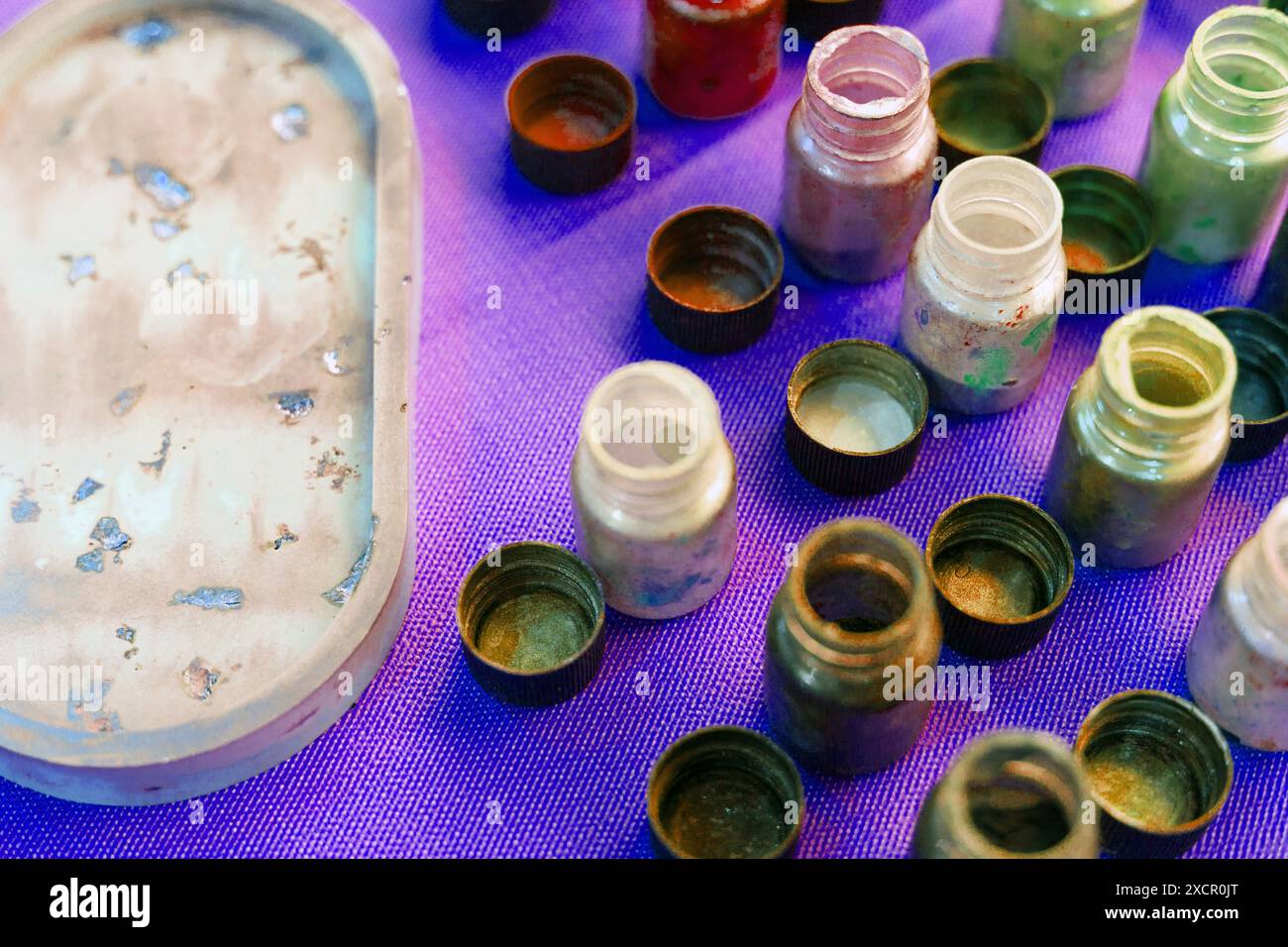 color bottles for resin art. Mixing epoxy in plastic cups for casting ...