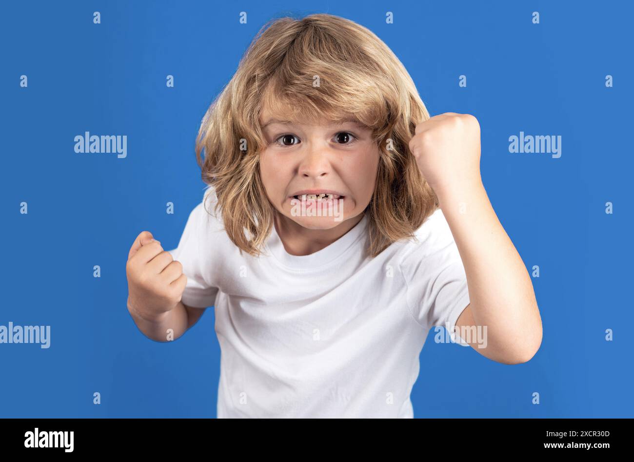 Child with angry expression in studio. Angry hateful little boy, child ...