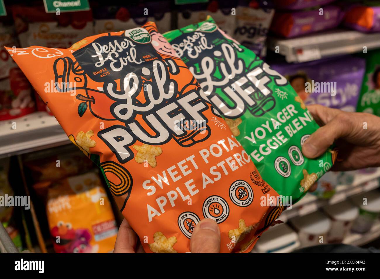 Packages of Lesser Evil brand vegetable puffs in the childrenÕs foods ...