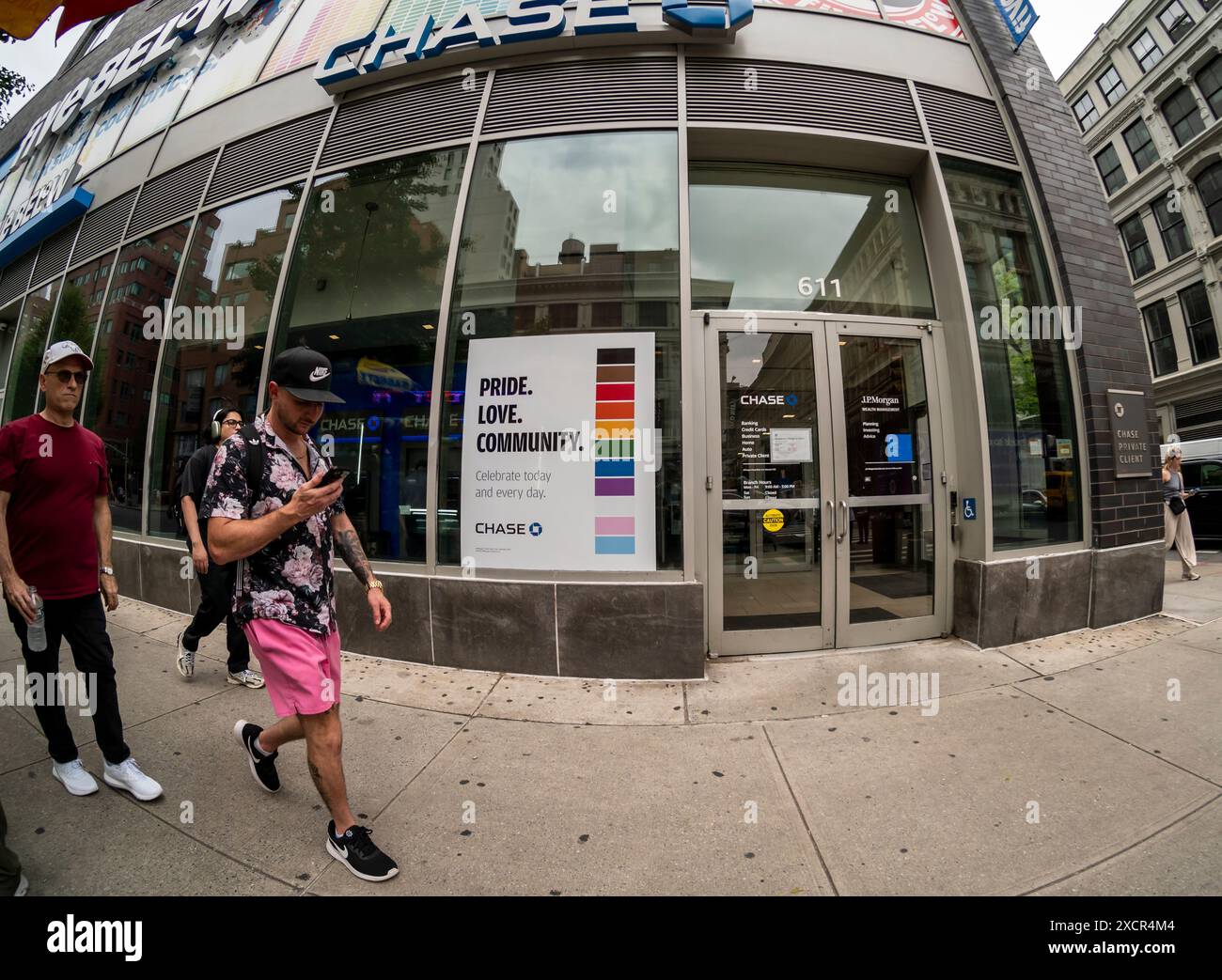 A sign in the window of a Chase bank in the Flatiron neighborhood in ...
