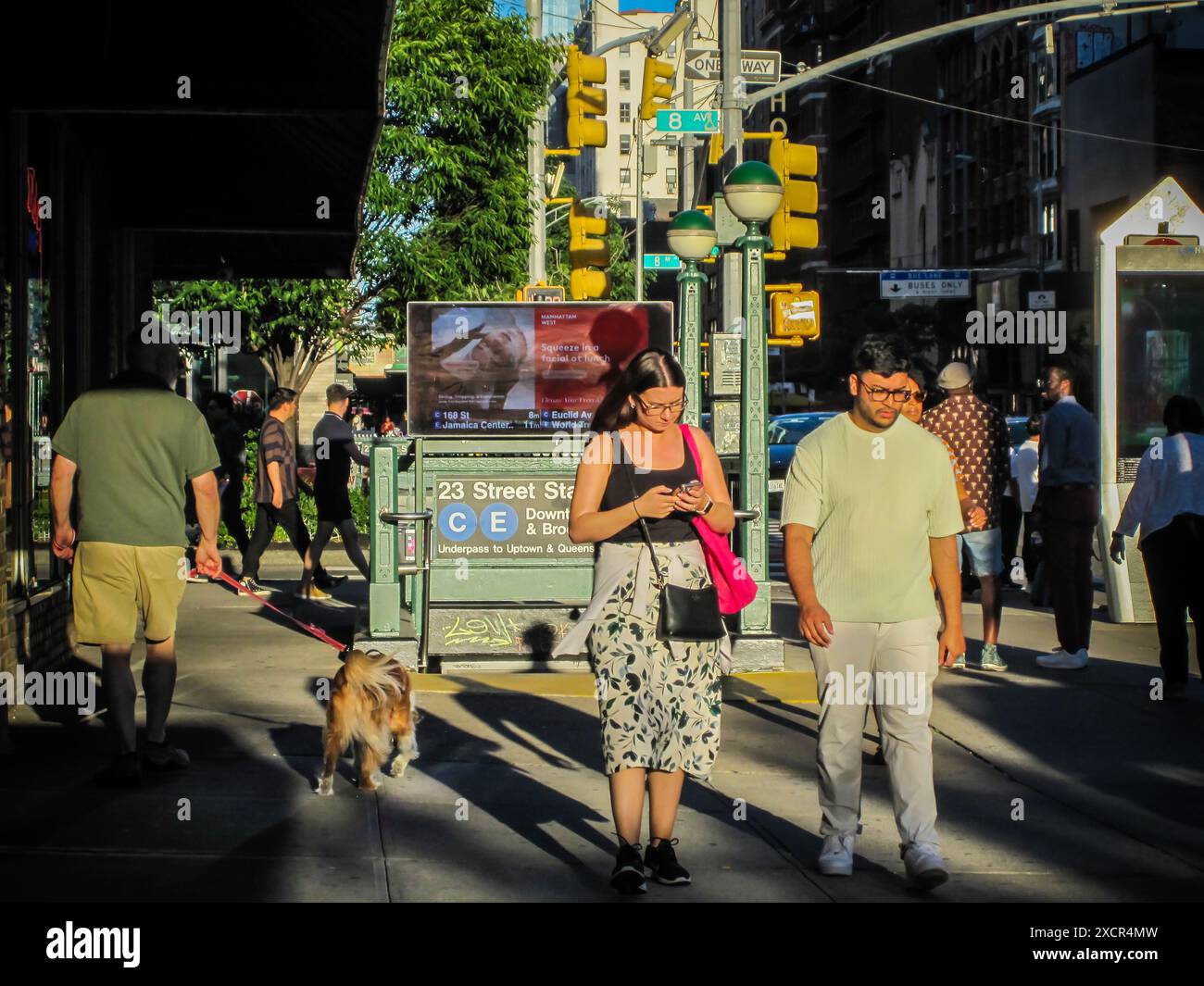 People hurry about their business in the late afternoon in Chelsea in ...