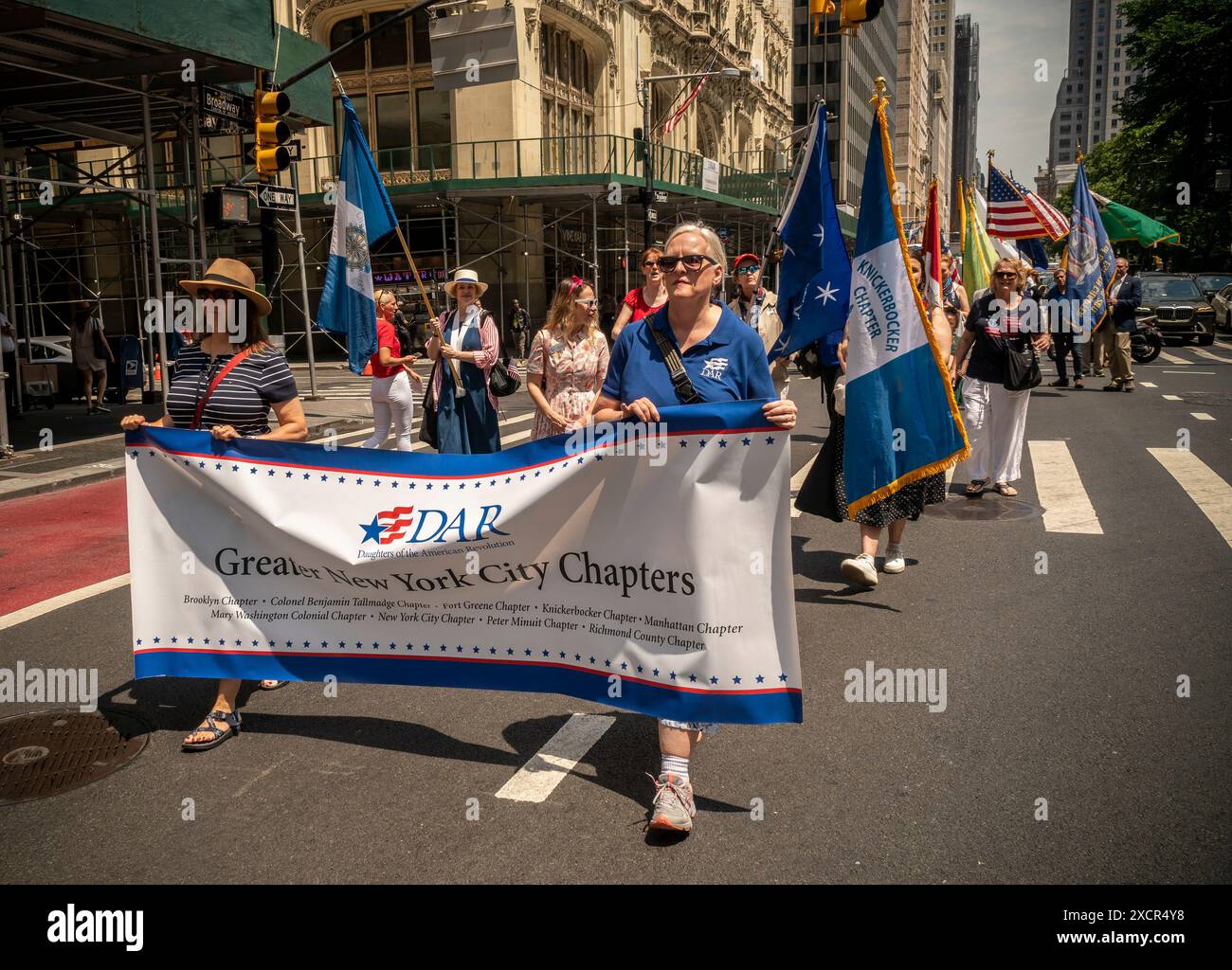 Marchers in red hi-res stock photography and images - Alamy