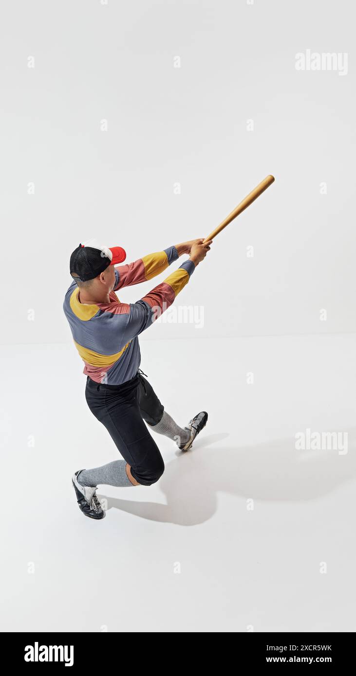 Isometric view on young guy, baseball player in motion with bat, laying ...