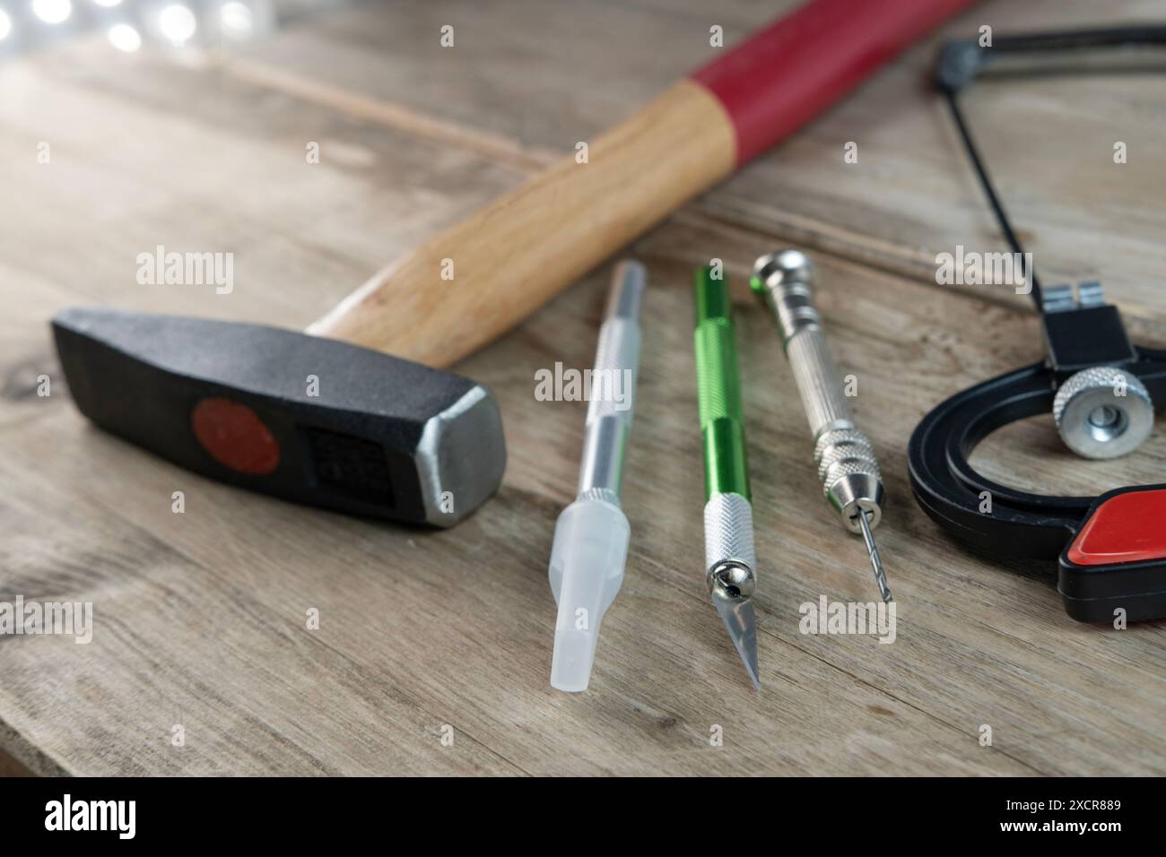 Creative project crafting hand tools jigsaw, knife and drill arranged ...