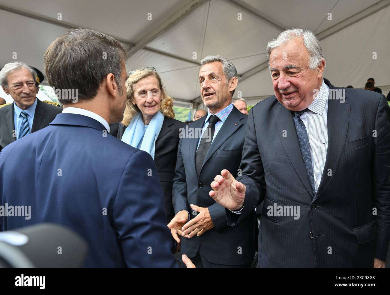 Emmanuel Macron shakes hands with Gerard Larcher as Nicolas Sarkozy ...