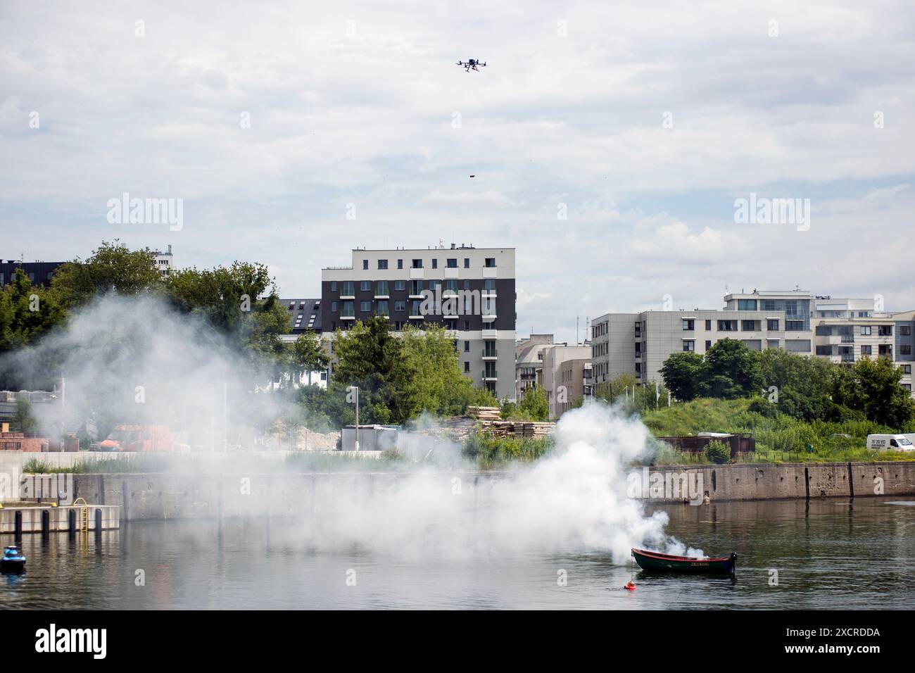 A boat seen burning on water during a water rescue exercise in Warsaw ...