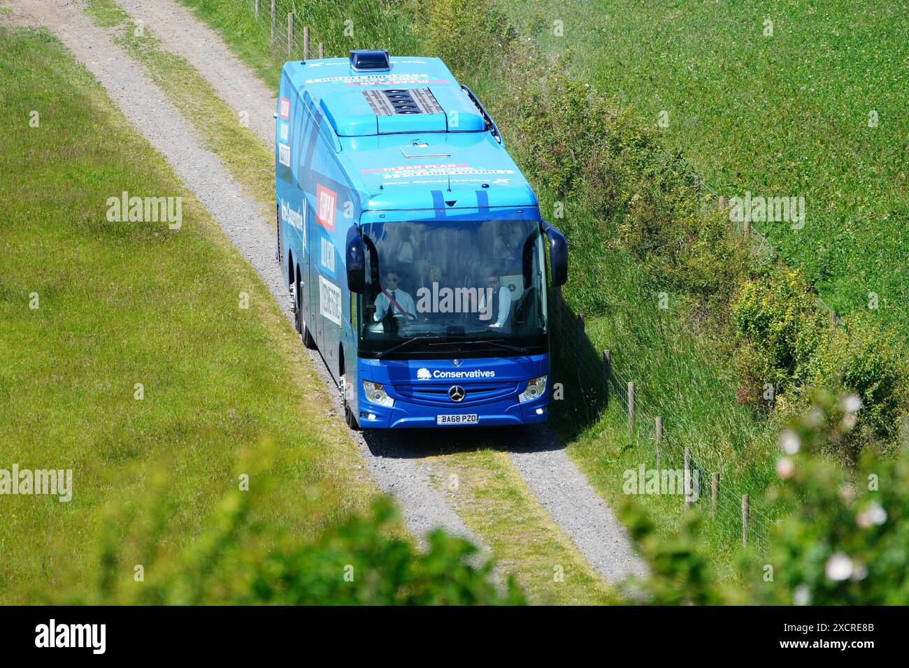 The Conservative Party battle bus arrives at a farm in Devon, while on ...