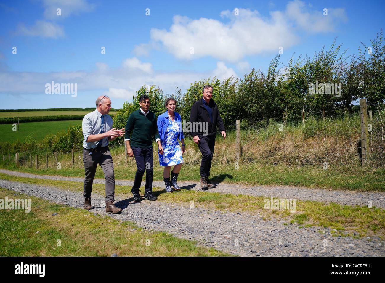 (left to right) Farmer David Chugg, Prime Minister Rishi Sunak ...