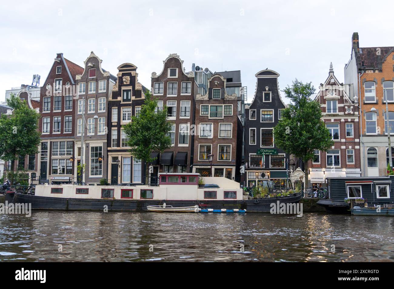 Amsterdam, The Netherlands. Traditional Dutch terraced houses by the ...