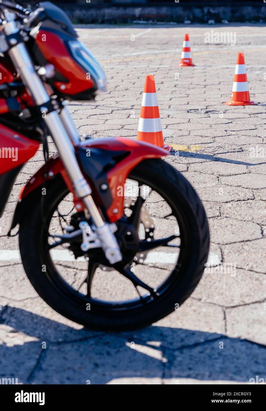 Concept of motorcycle school of driving. Riding between cones, lesson ...
