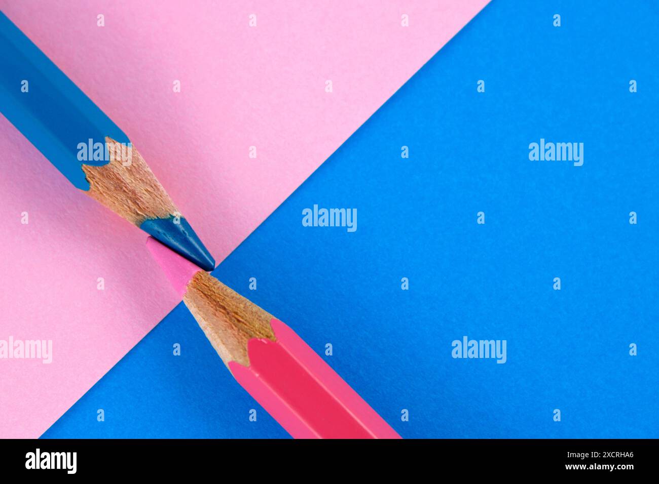 Blue and pink pencil on a background of the opposite color Stock Photo ...