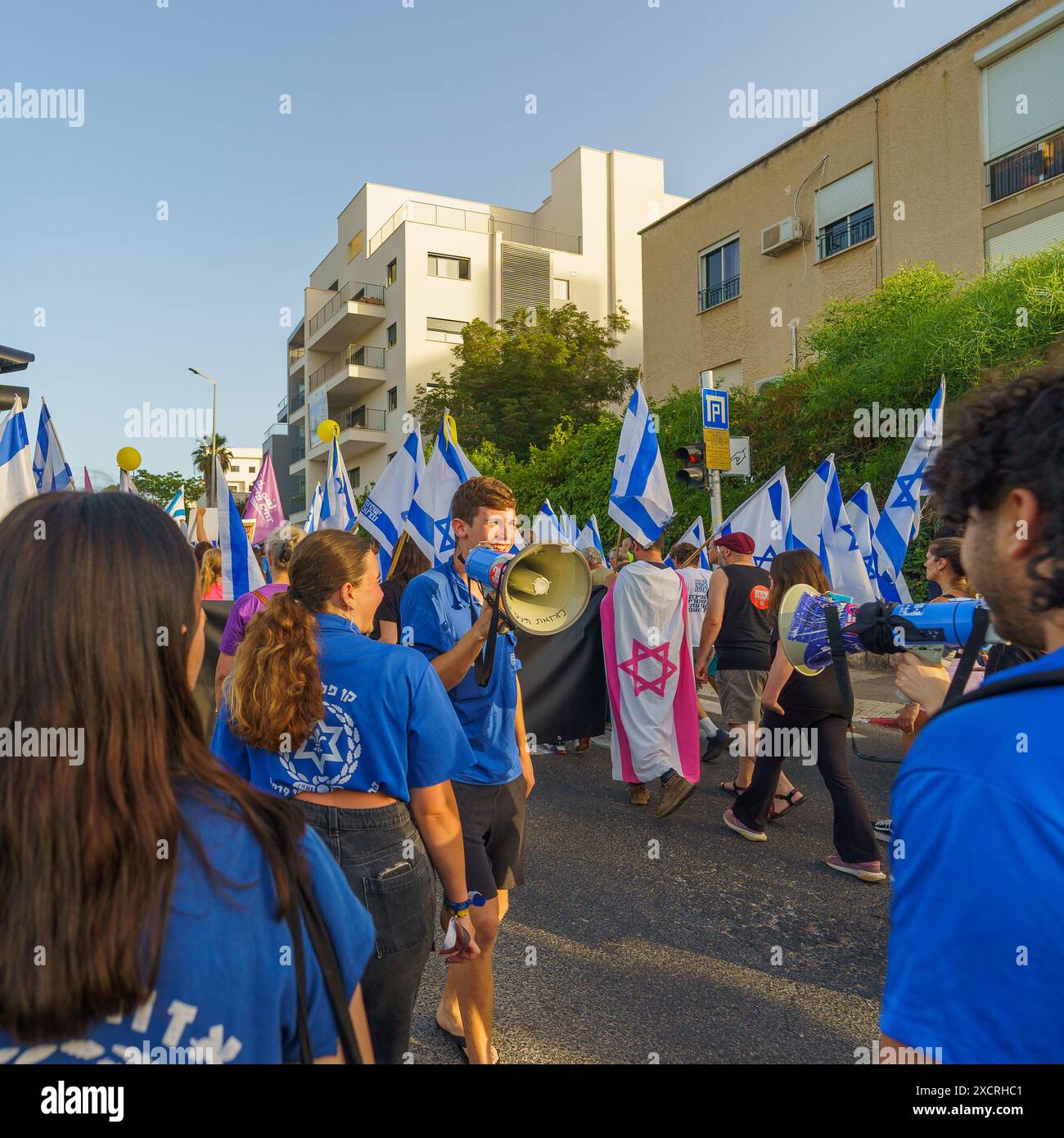 Haifa, Israel - June 15, 2024: People in a protest march (with Hashomer ...