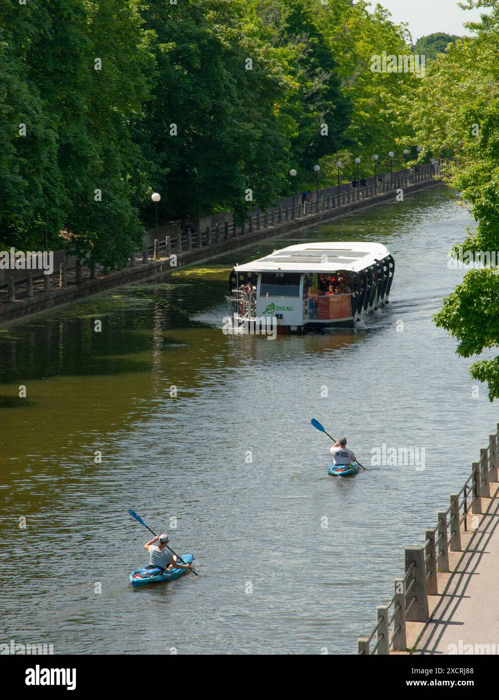 Tour Boat on the Rideau Canal Going South and Couple in Kayaks Going ...
