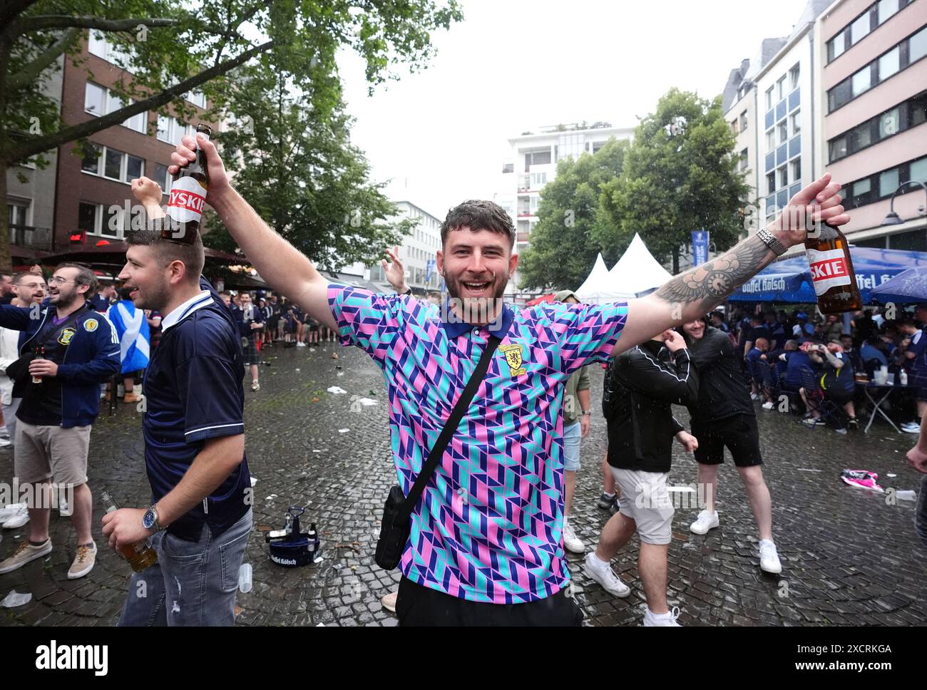 Scotland fans in the rain at the Old Market, Cologne. Scotland will ...