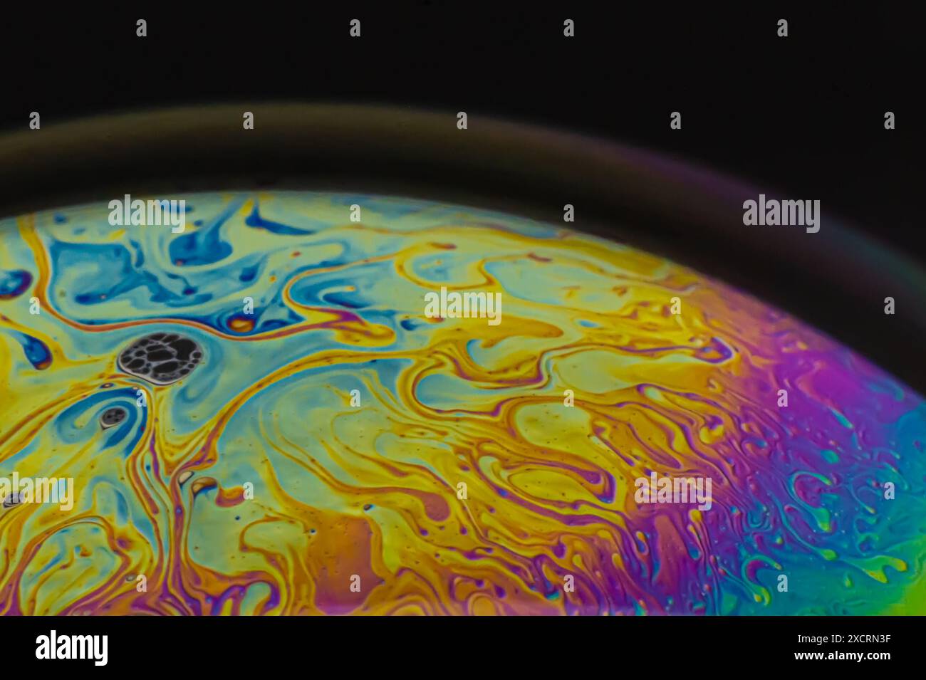 Close up macro, detailed shot of a soap bubble in professional, studio ...