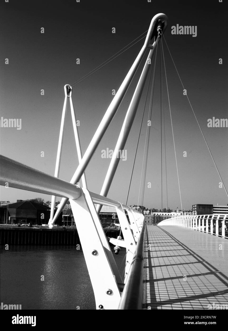 Iconic pedestrian cable stayed footbridge over the river Usk at Newport ...