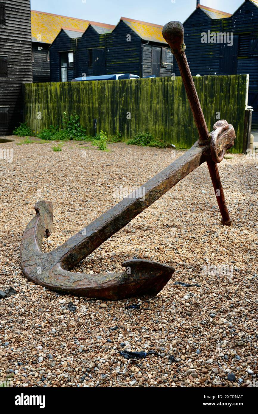 Heavy vintage rusting iron anchor with Victorian wooden net shops ...