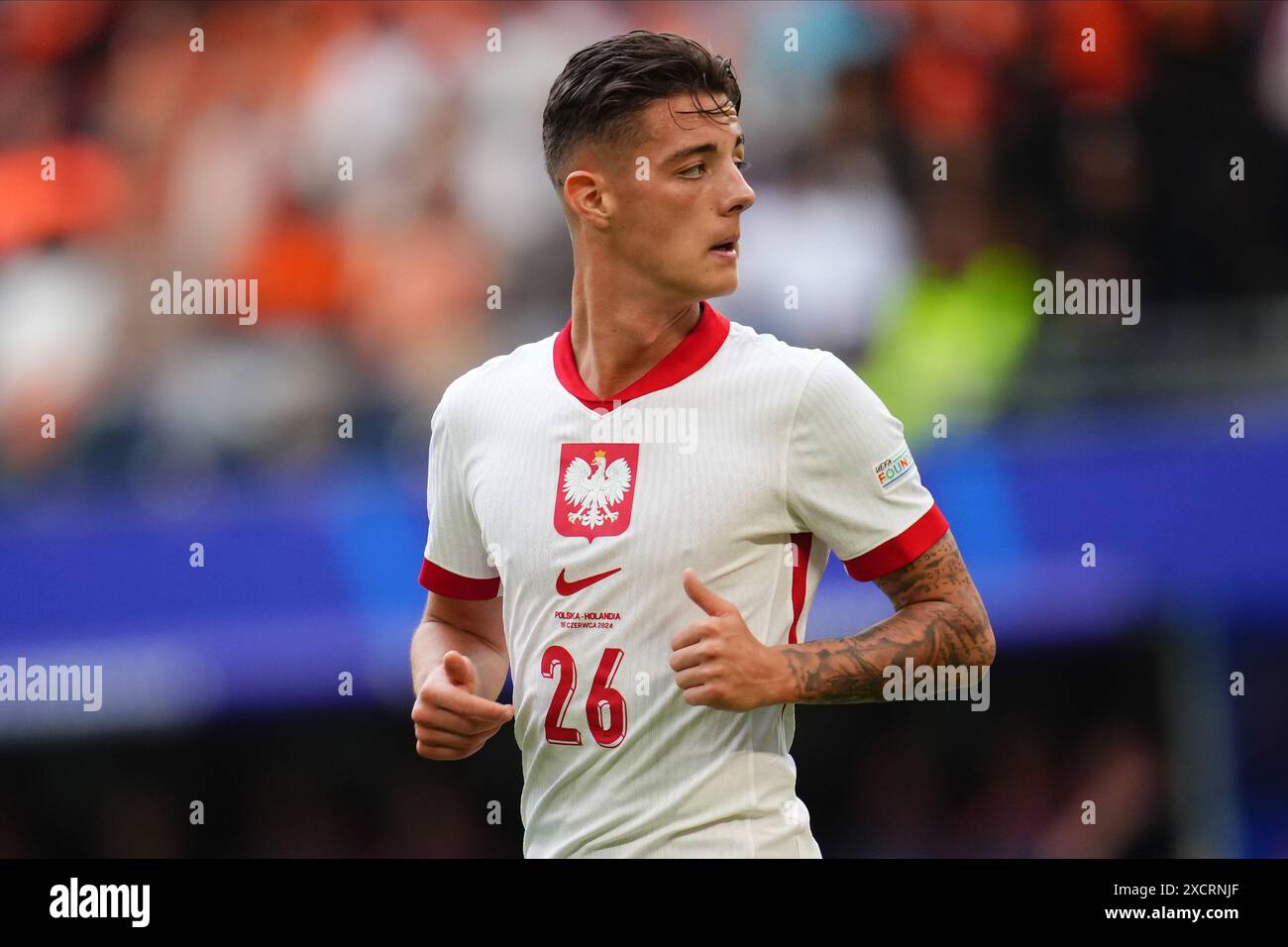 Hamburg, Germany. 16th June, 2024. Kacper Urbanski of Poland during the UEFA Euro 2024 match ...